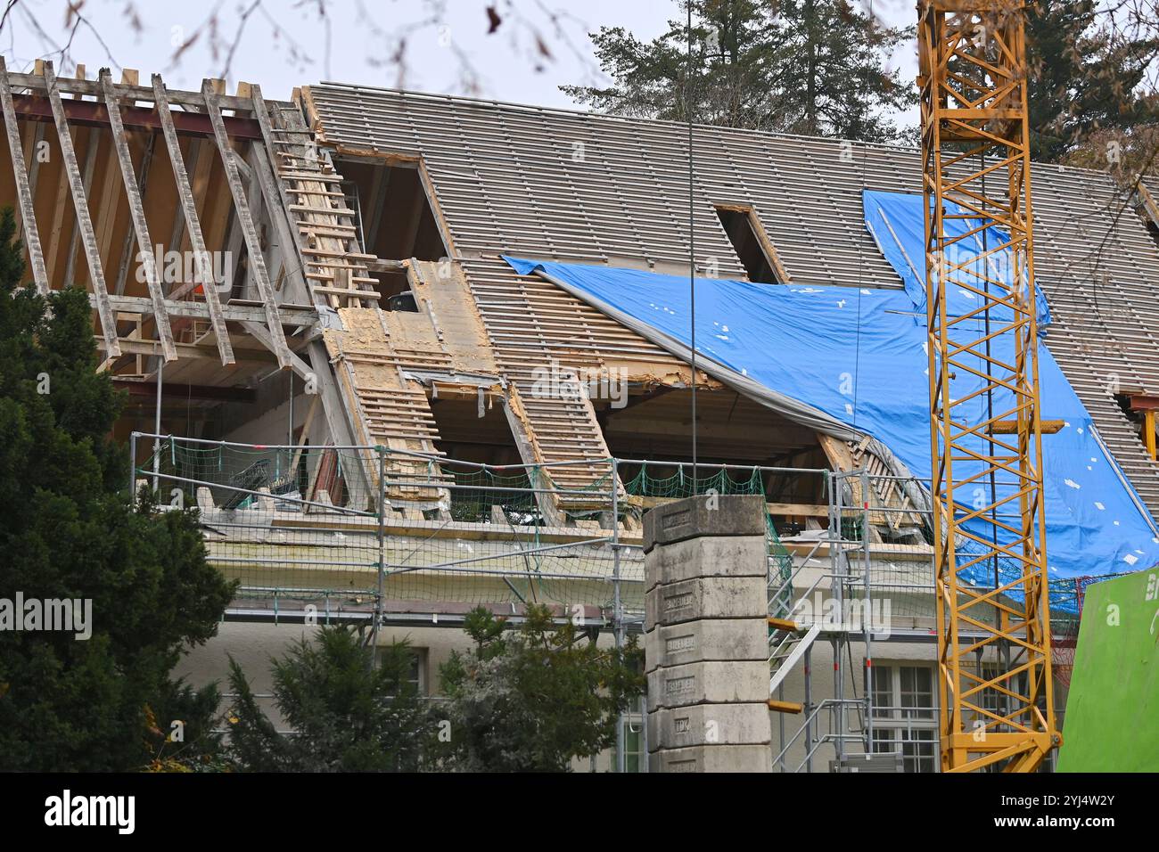Roof renovation. An old house in need of renovation gets a new roof ...