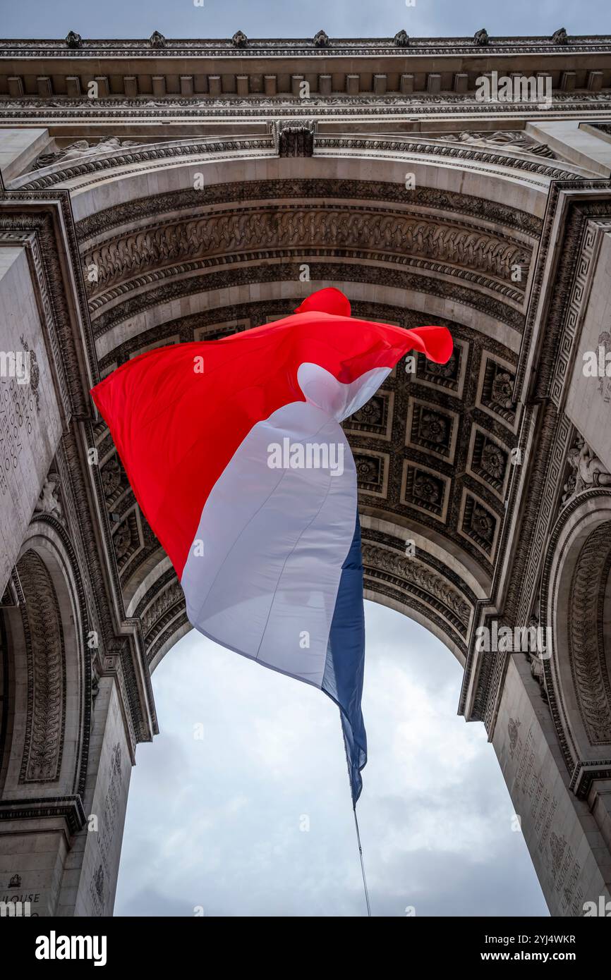 Paris, France - 11 11 2024: View of The Triumphal arch with French Flag ...