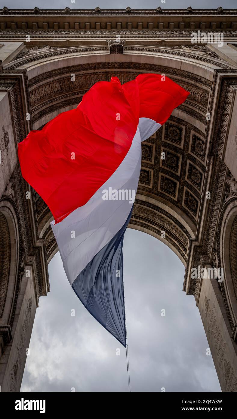 Paris, France - 11 11 2024: View of The Triumphal arch with French Flag ...