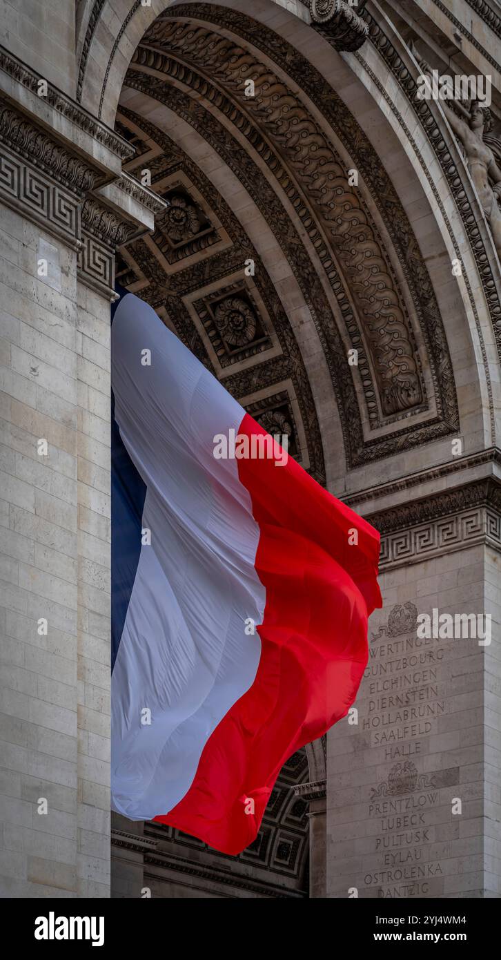 Paris, France - 11 11 2024: View of The Triumphal arch with French Flag ...