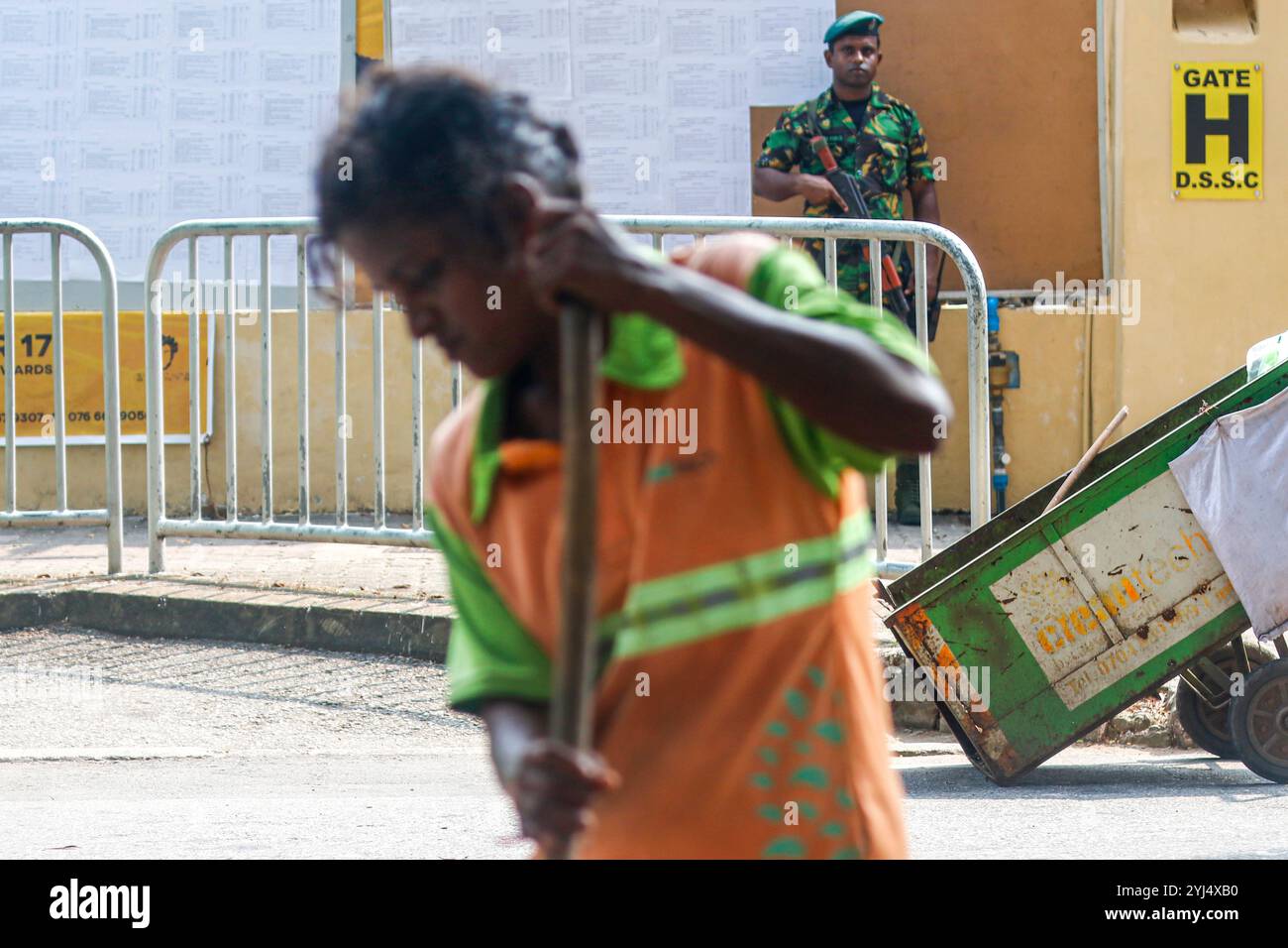 A Sri Lankan STF soldier guards a distribution center a day before the ...