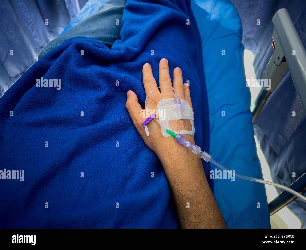 Closeup view of a Premature baby in the incubator and been hold by ...