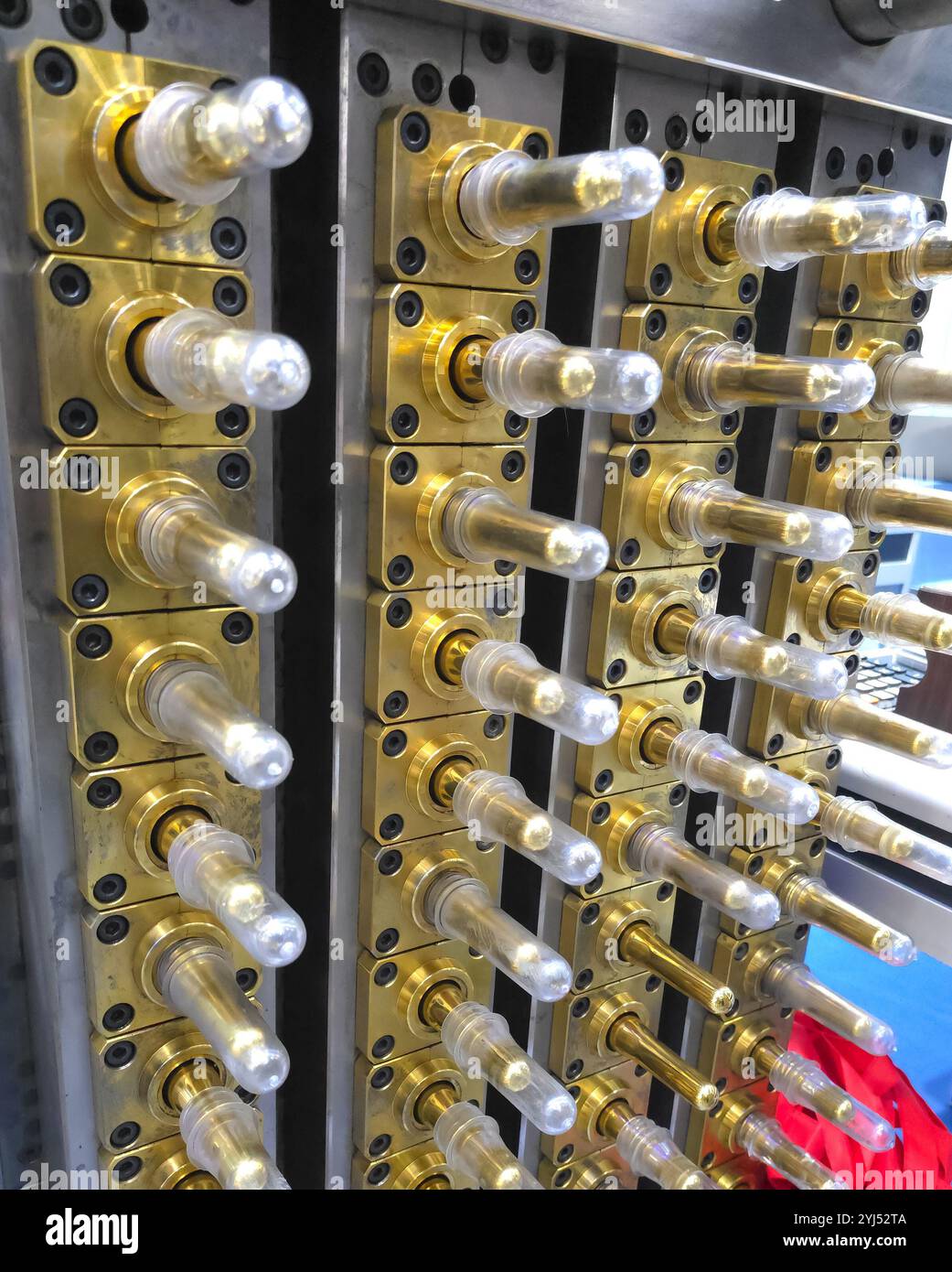 PET preform mold. Injection moulding machine Stock Photo - Alamy