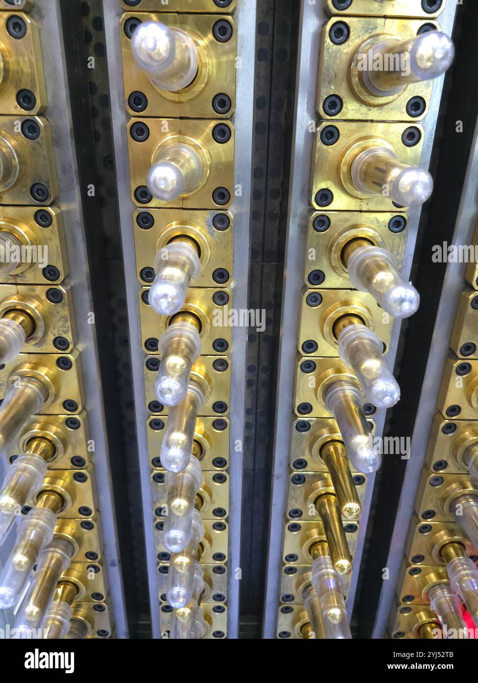 PET preform mold. Injection moulding machine Stock Photo - Alamy