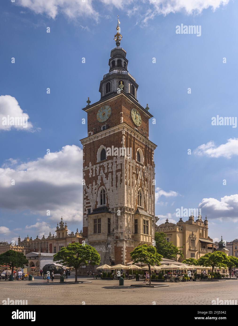 The majestic Krakow Town Hall Tower stands proudly, bathed in sunlight ...