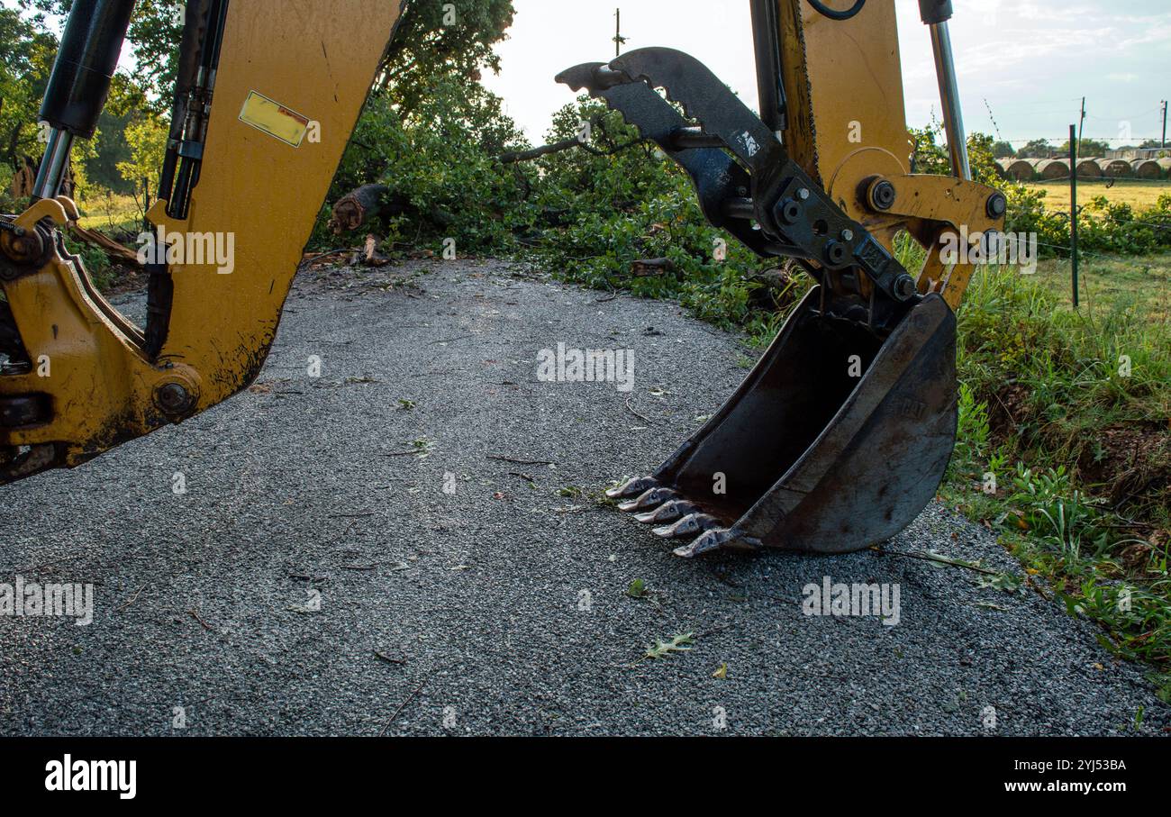 The road is impassable following a sudden wind storm in Missouri. The ...