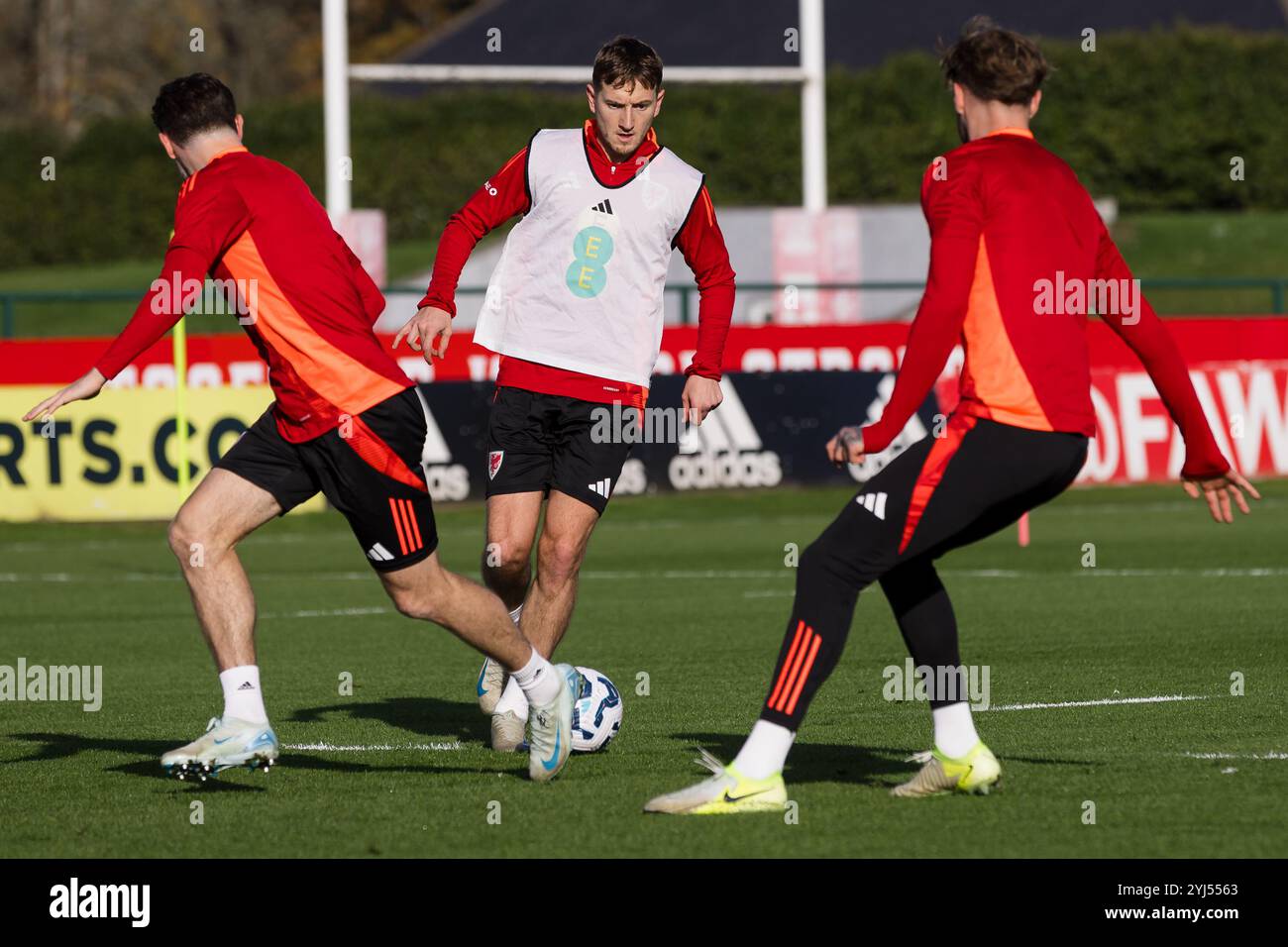 PONTYCLUN, UK. 13th Nov, 2024. Wales' David Brooks and Wales' Joe Rodon ...
