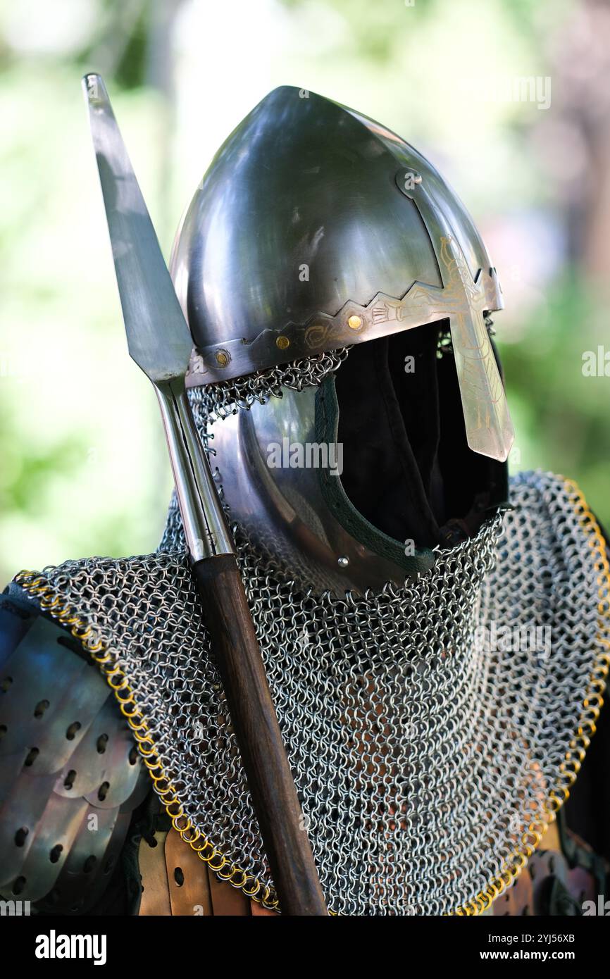 Medieval style helmet, chainmail and spear Stock Photo - Alamy
