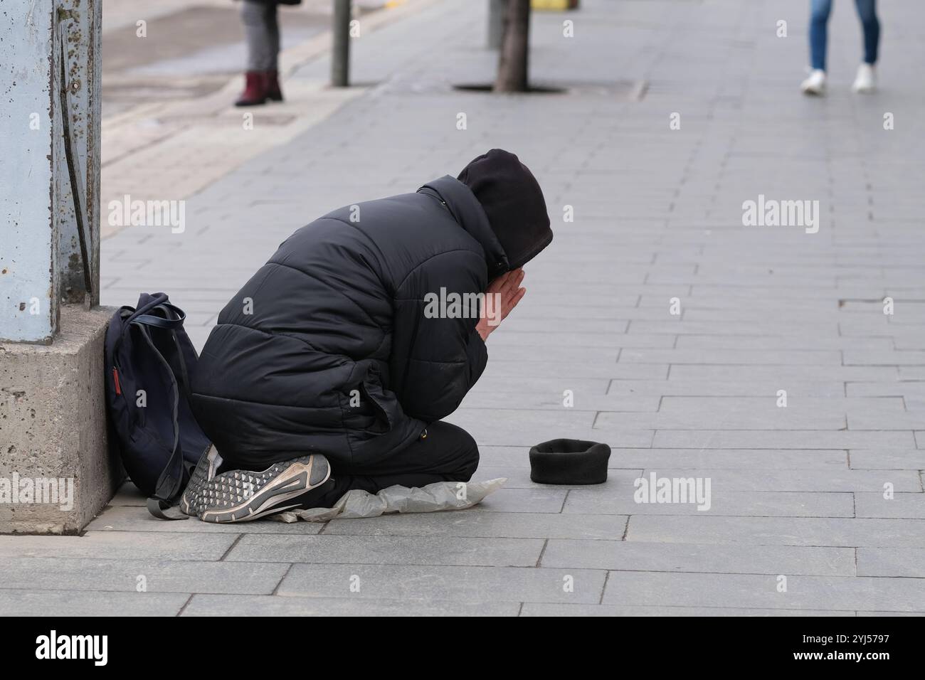 a man begging on the street Stock Photo - Alamy