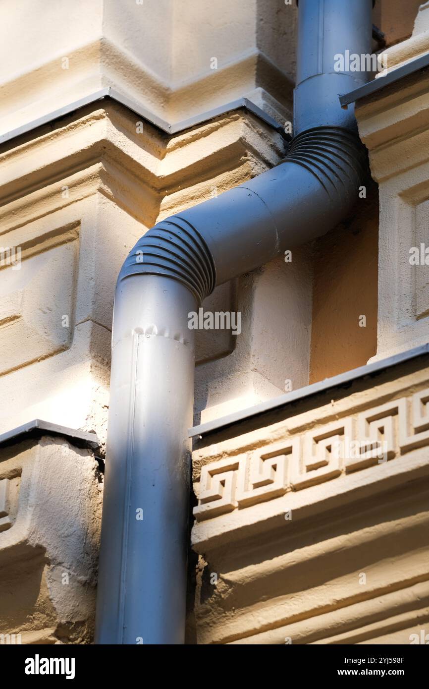 Gutter pipe on a bulding Stock Photo - Alamy