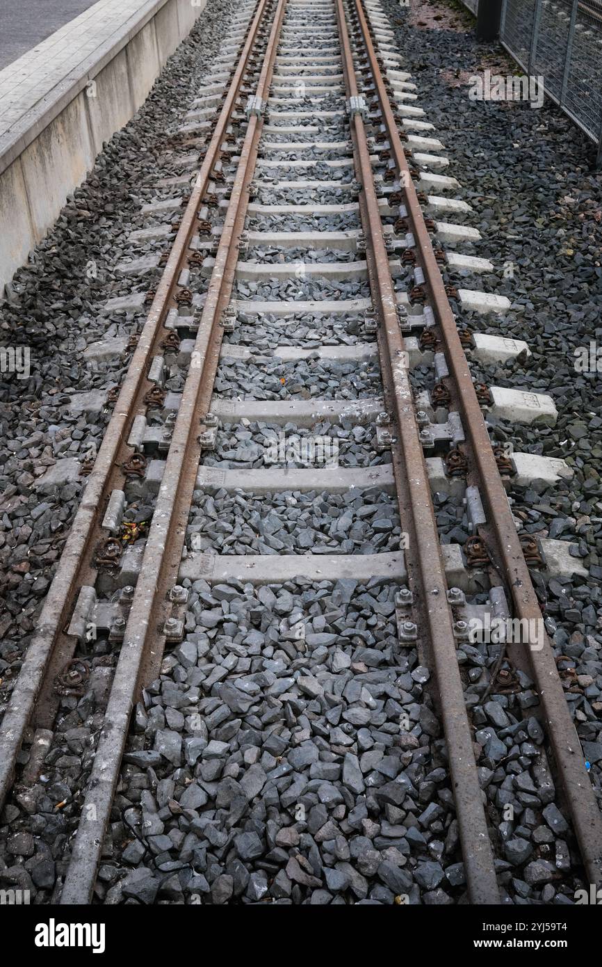 Railway tracks at a railway station Stock Photo - Alamy
