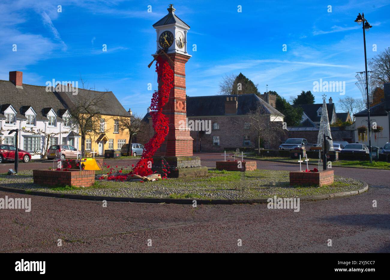 Poppy covered Town Square clock in Usk South Wales. Commemorating ...