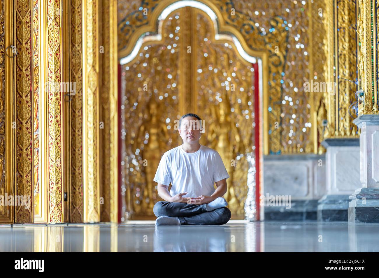 Asian man meditates on hi-res stock photography and images - Alamy