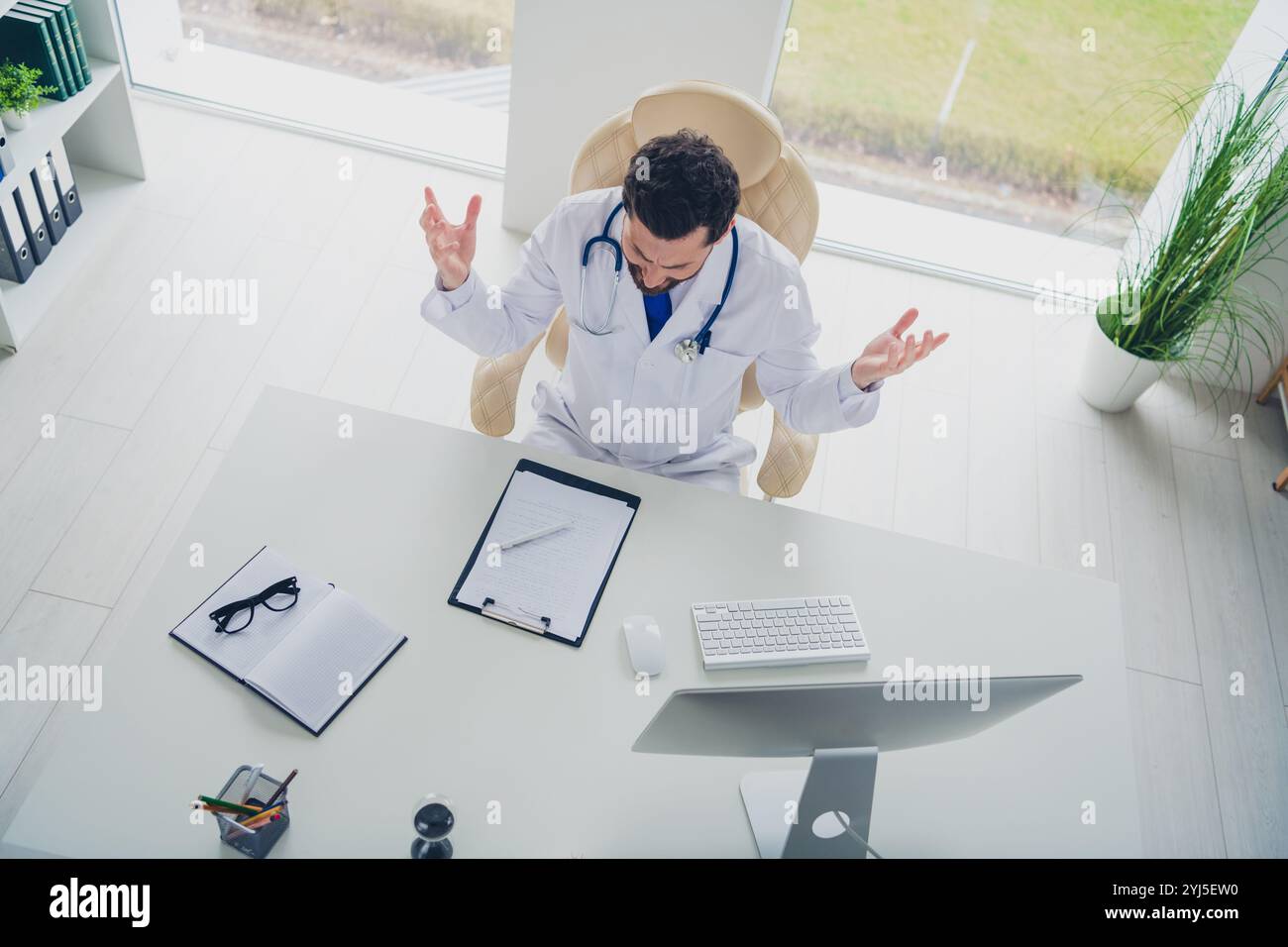 Top view photo offurious doctor look clipboard screaming trouble ...