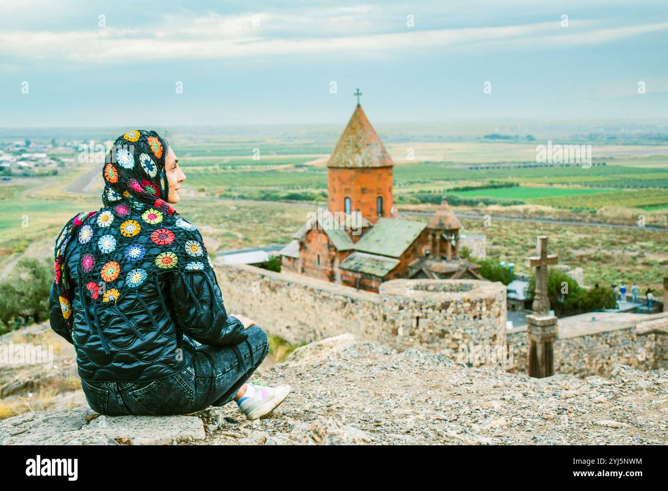 Young Woman on viewpoint wear modest outfit sit enjoy travel visit ...