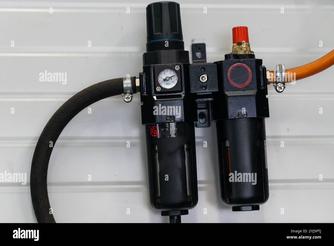 dehumidifier and flow meter on the compressed air line in the car ...
