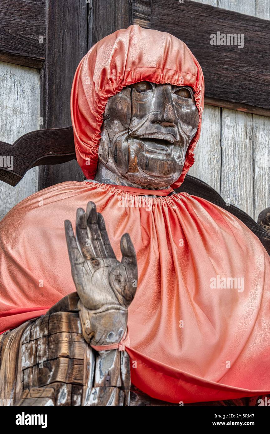 The wooden statue of Binzuru (Pindola Bharadvaja) at the entrance of ...