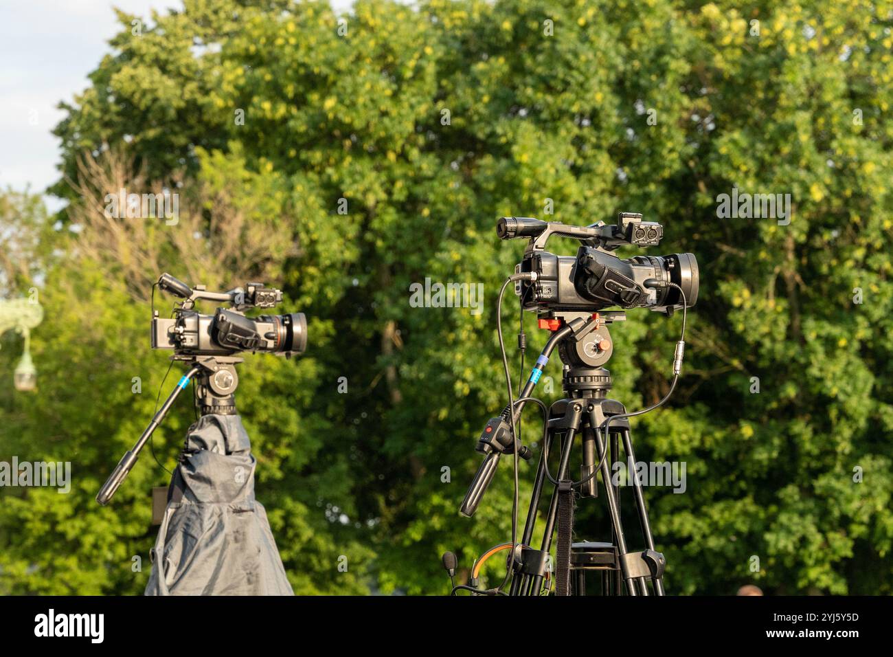 Professional cameras are readied for capturing outdoor activities Stock ...