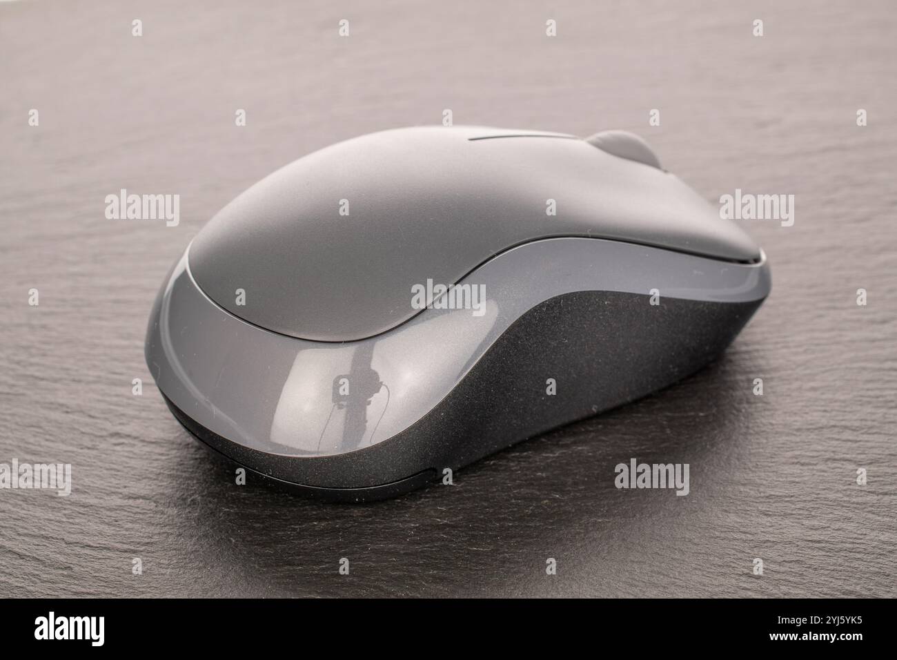 Grey wireless computer mouse hi-res stock photography and images - Alamy
