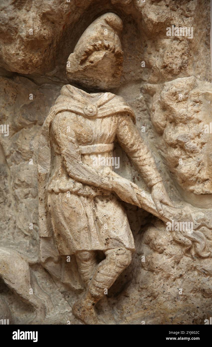 Relief of the myth of god Mithras. Cautes with torch. Rome, Tore ...