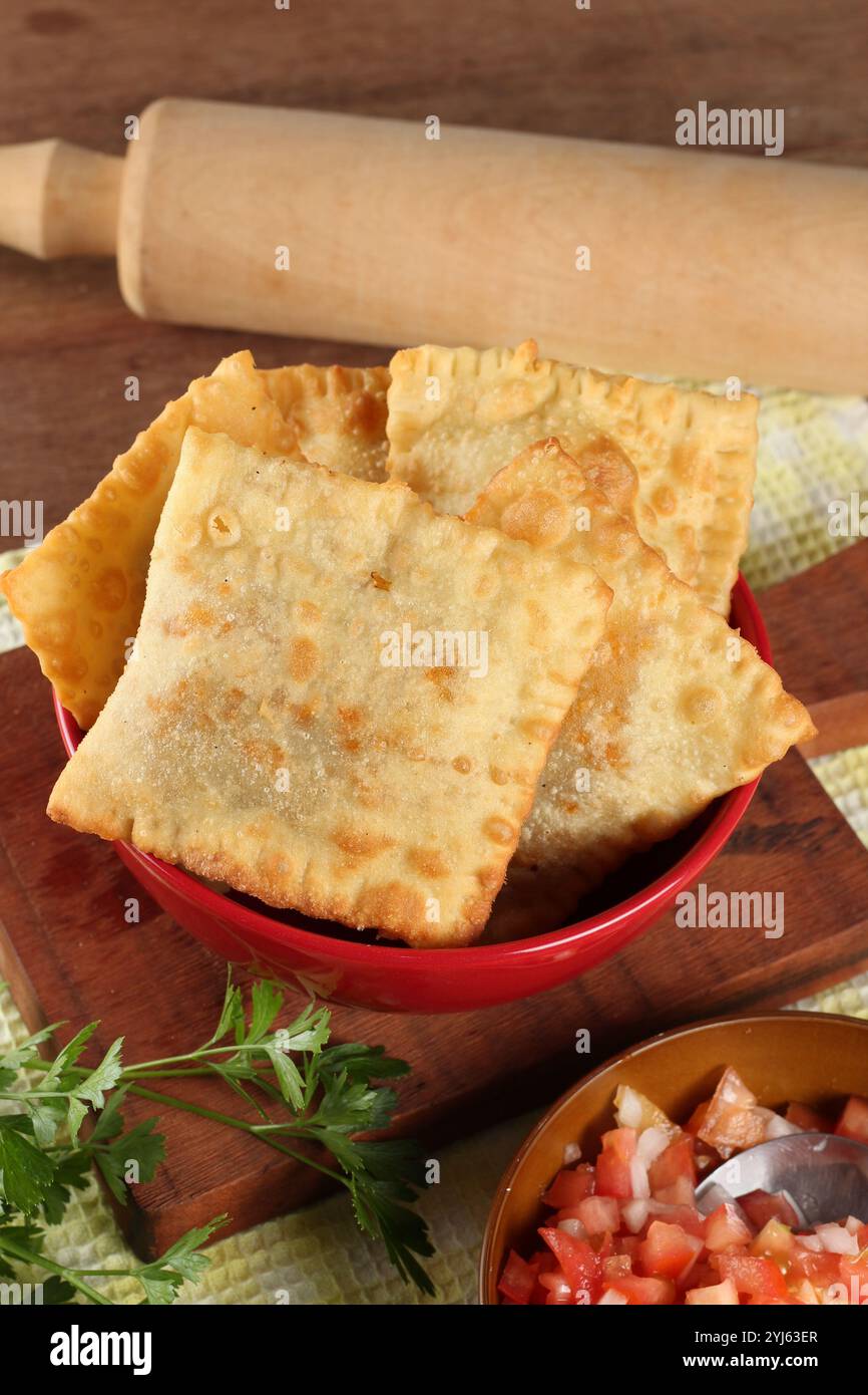 fried pastries with crispy dough and stuffed with meat Stock Photo - Alamy