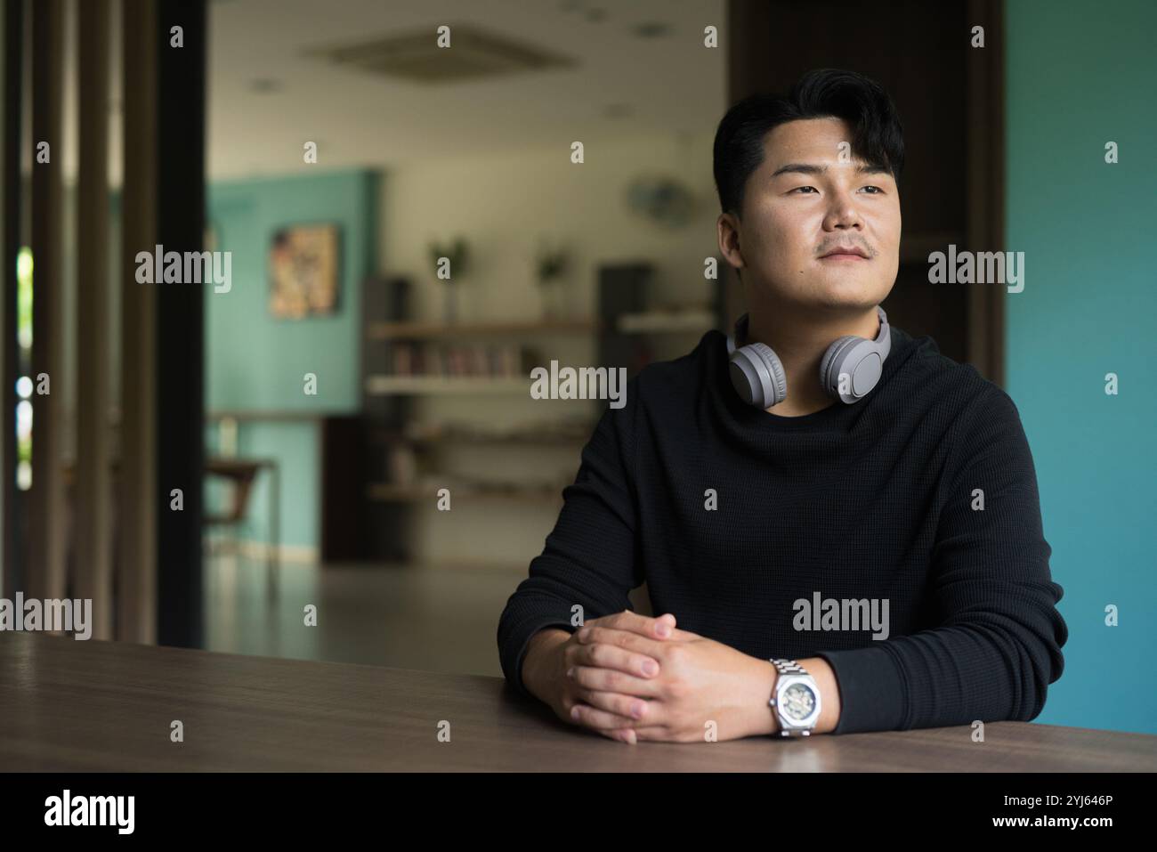 Portrait friendly chinese man sitting hi-res stock photography and ...