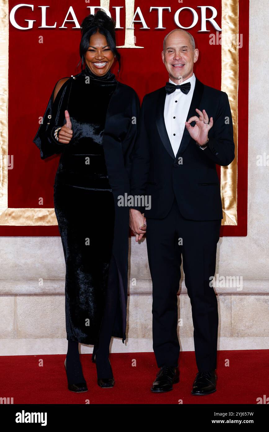 Tracy Robbins, left, and Brian Robbins pose for photographers upon ...