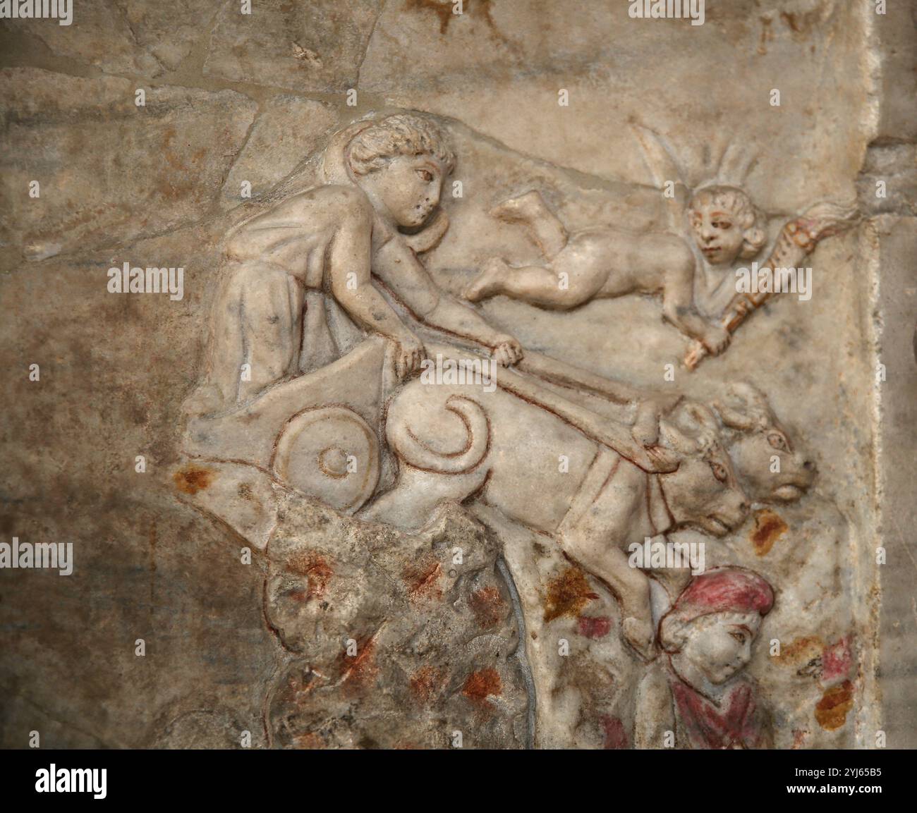 Mithraic relief. Remains of the origianl colour and gilding, shows a ...