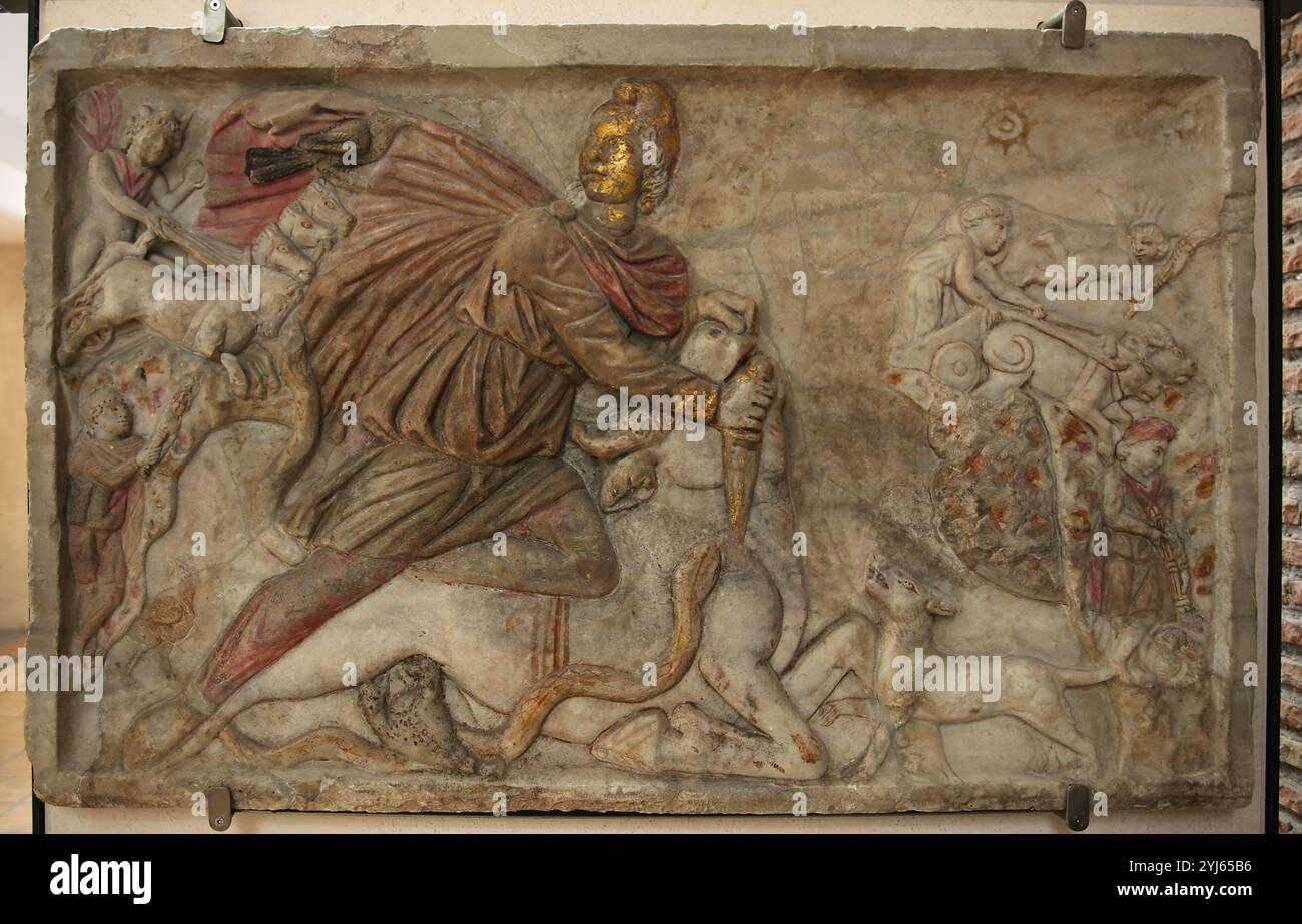 Mithraic relief. Remains of the origianl colour and gilding, shows a ...