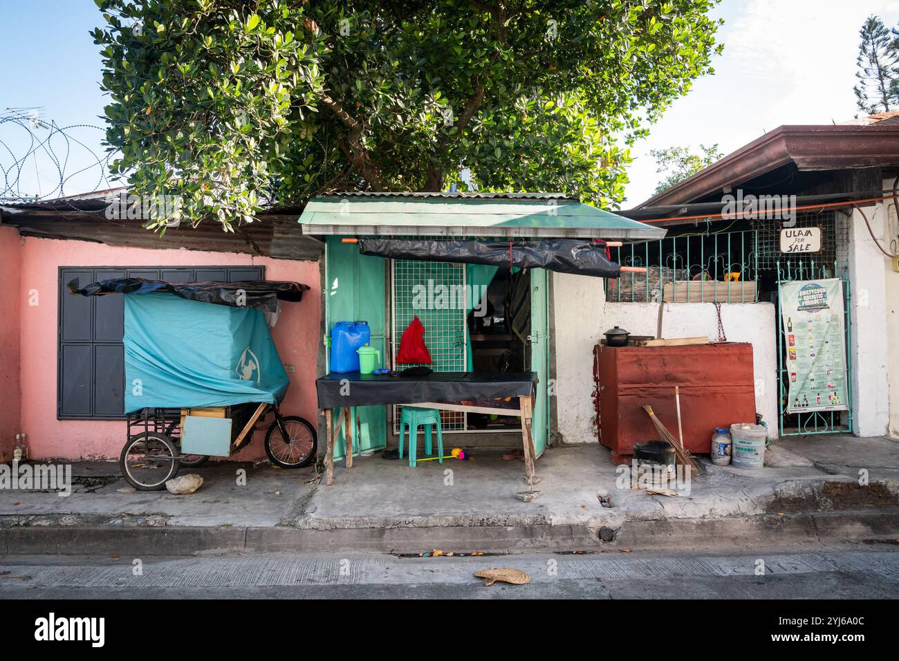 A small closed shop in Angeles City, The Philippines Stock Photo - Alamy