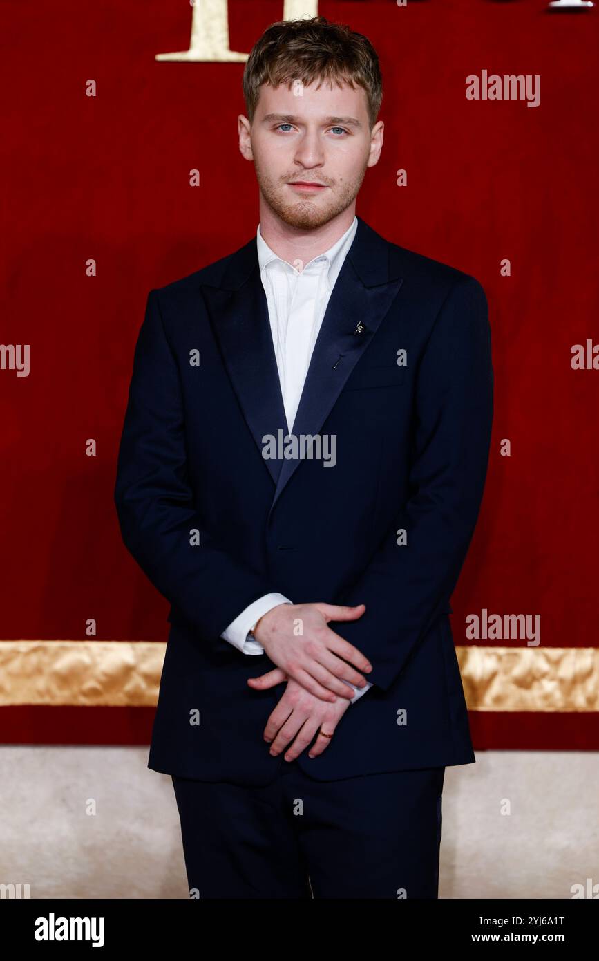 Fred Hechinger poses for photographers upon arrival at the premiere of ...