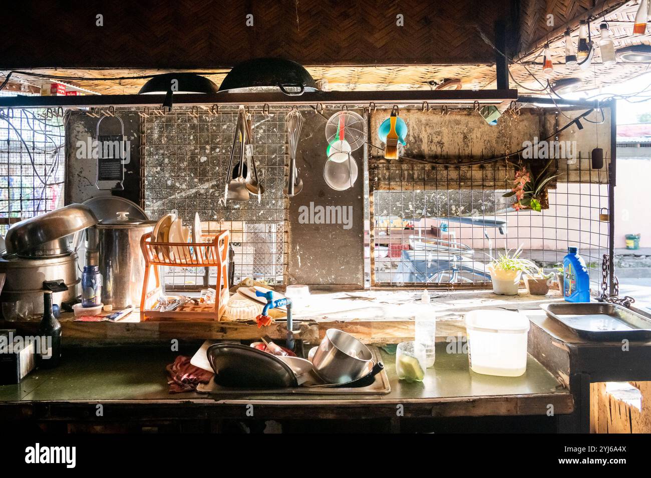 A photograph of the kitchen of an old run down bar in Angeles City, The ...