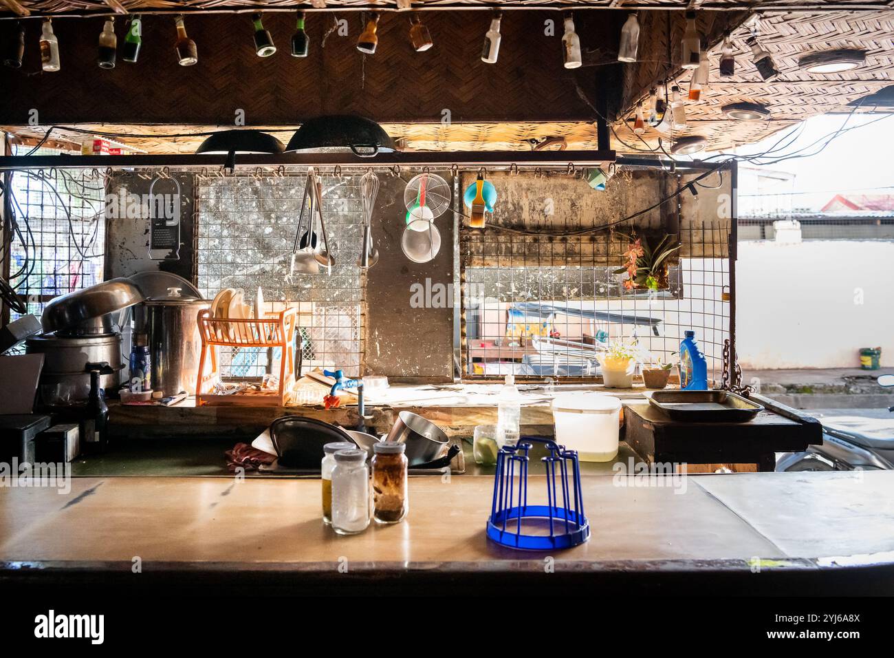 A photograph of the kitchen of an old run down bar in Angeles City, The ...
