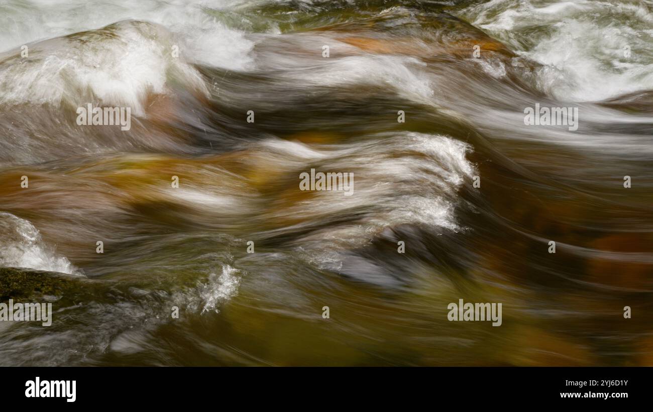 Water rolling over rocks hi-res stock photography and images - Alamy