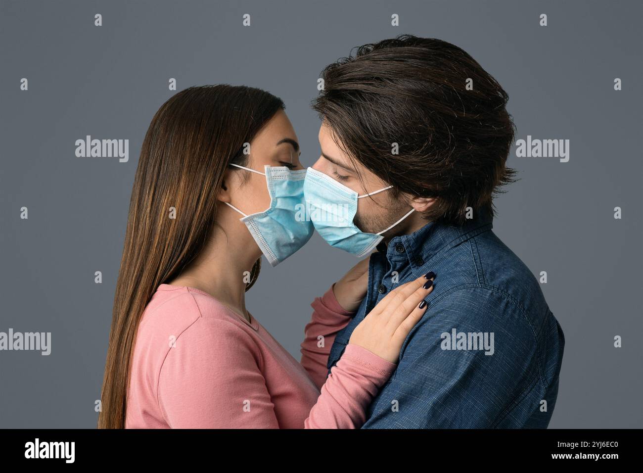 Quarantine Romantic. Young Couple In Love Kissing Each Other With ...