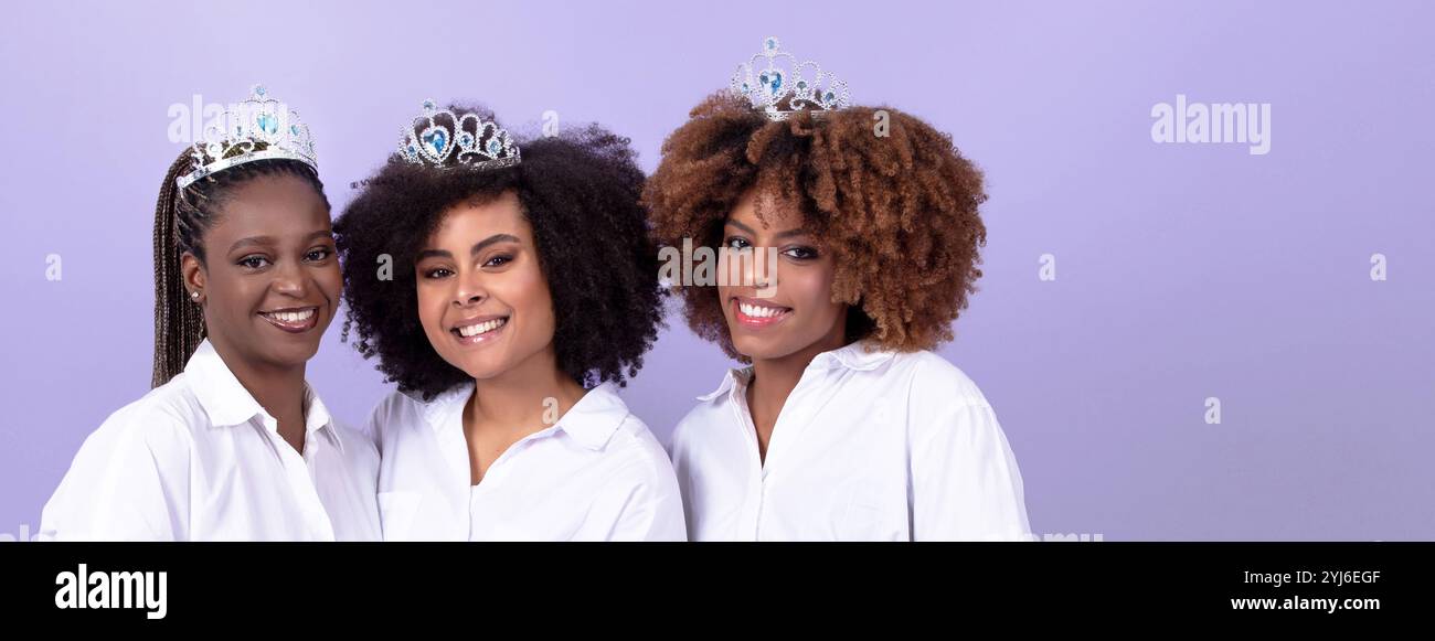 Three black women with beautiful, diverse hairstyles and crowns smile ...