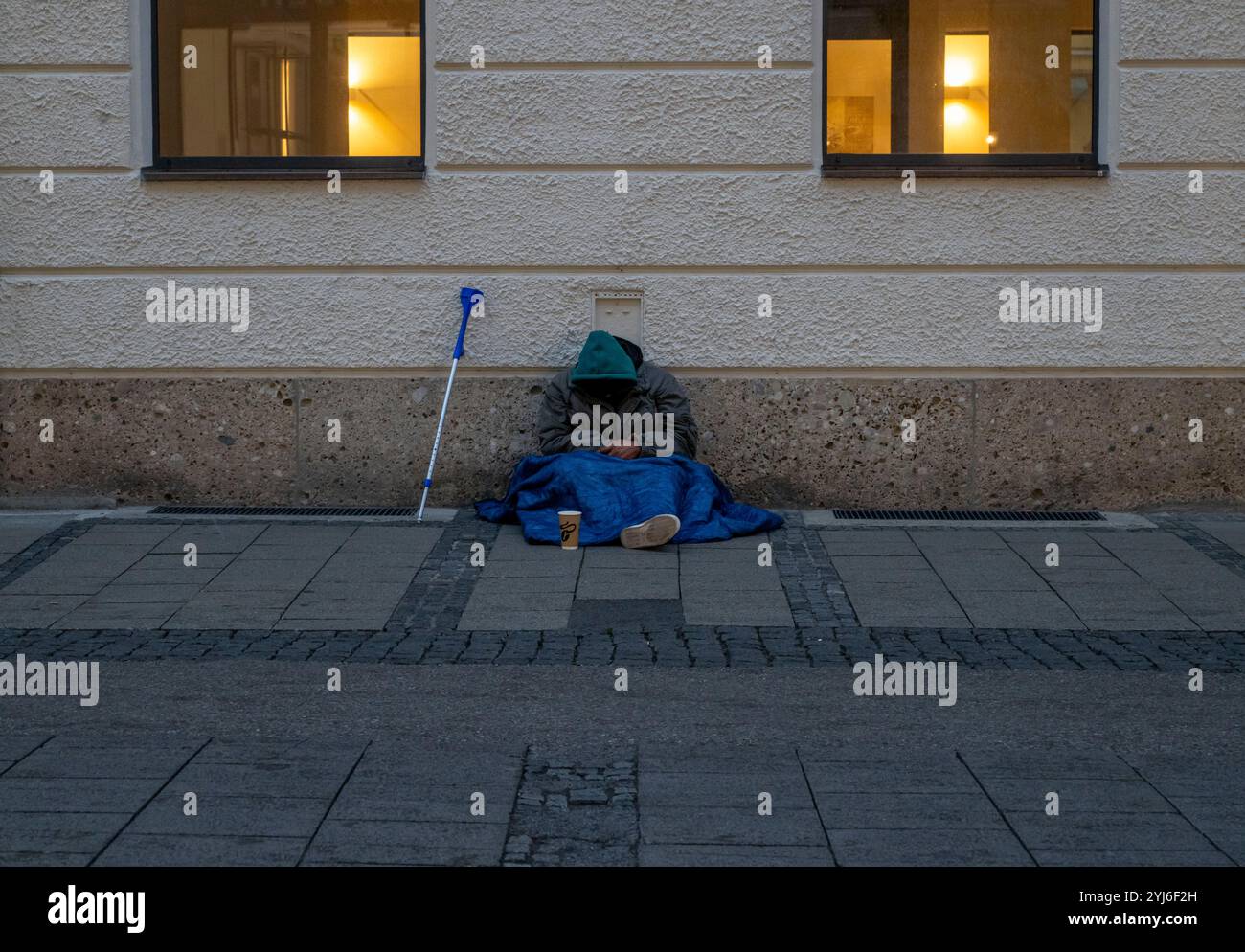 Munich, Germany. 13th Nov, 2024. A homeless man sleeps in the ...