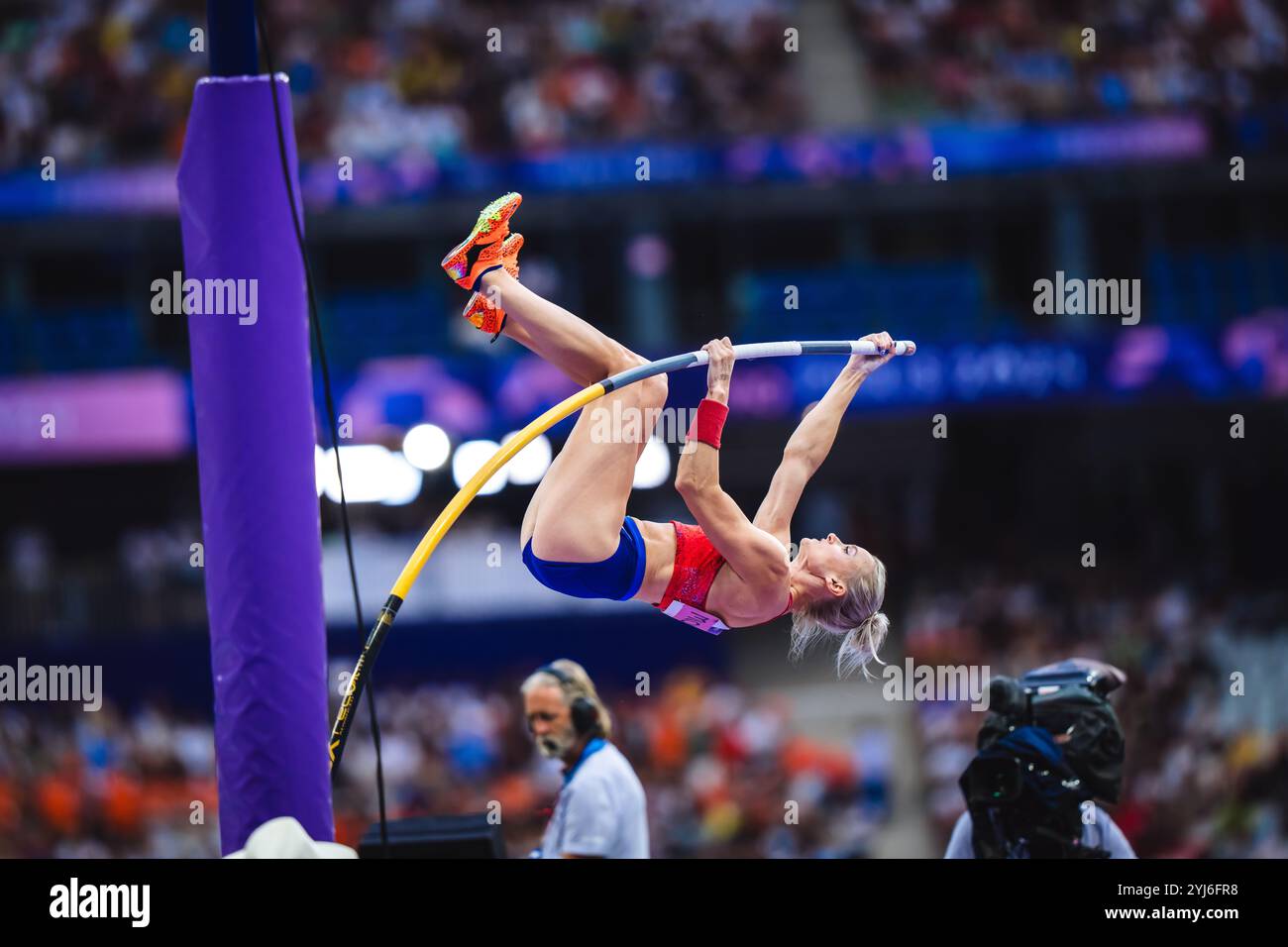 Katie Moon participating in the pole vault at the Paris 2024 Olympic ...