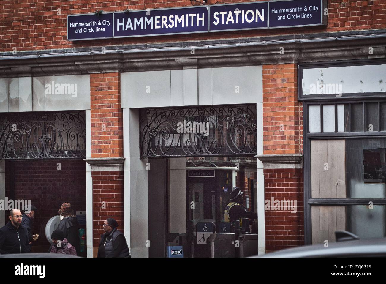 A brick building with a sign above the entrance that reads "HAMMERSMITH ...