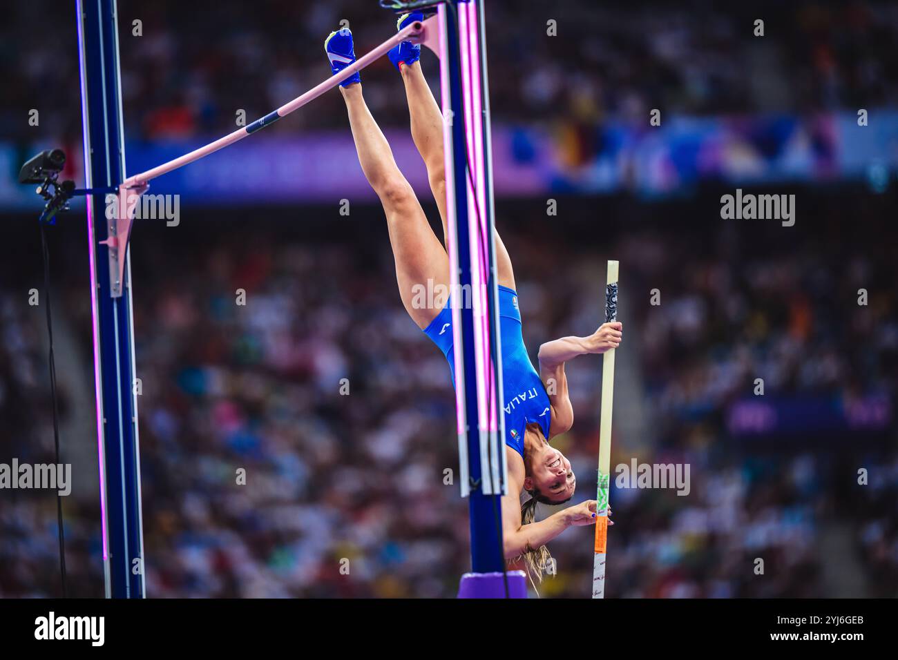 Elisa Molinarolo participating in the pole vault at the Paris 2024 ...