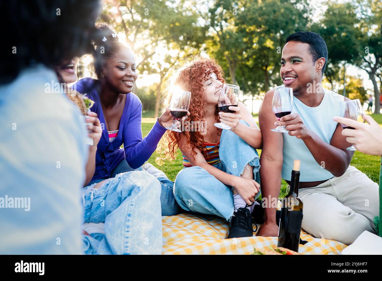Friends dinner, Group of people celebrating with wine outside city at ...