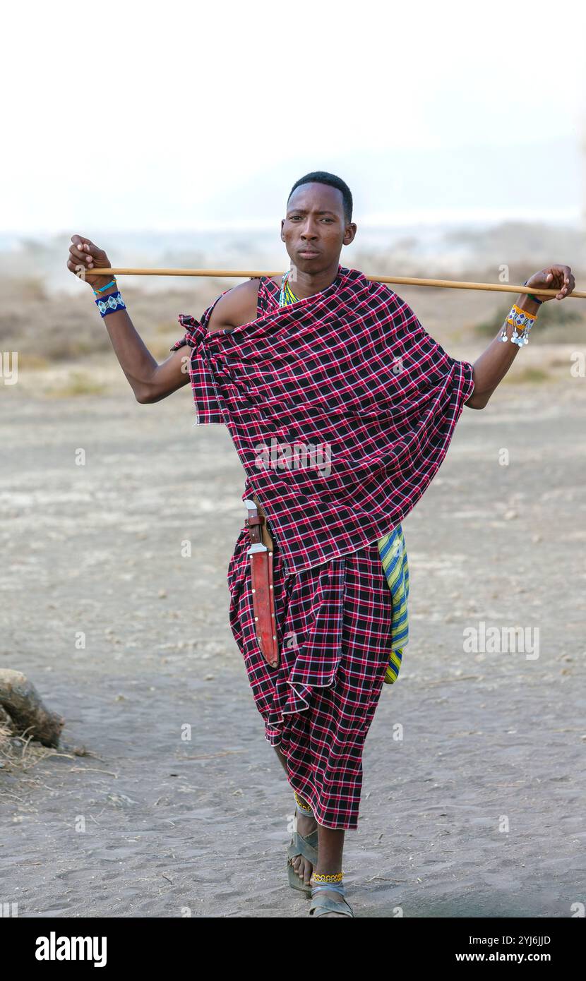 Maasai man with stick East Africa Stock Photo - Alamy