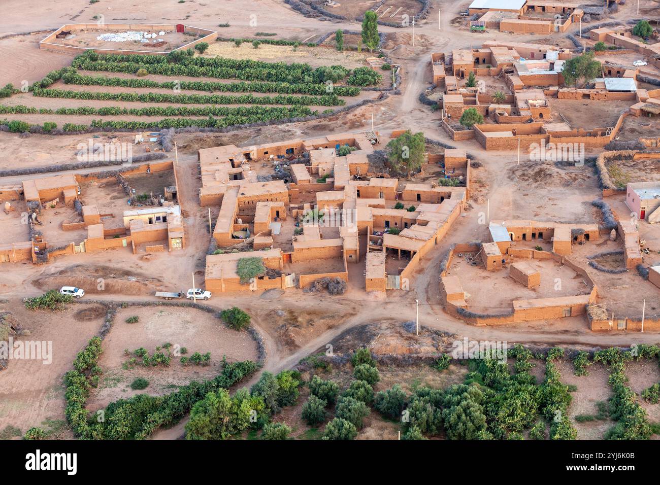 Aerial view of a traditional Moroccan village in a desert plain at the ...