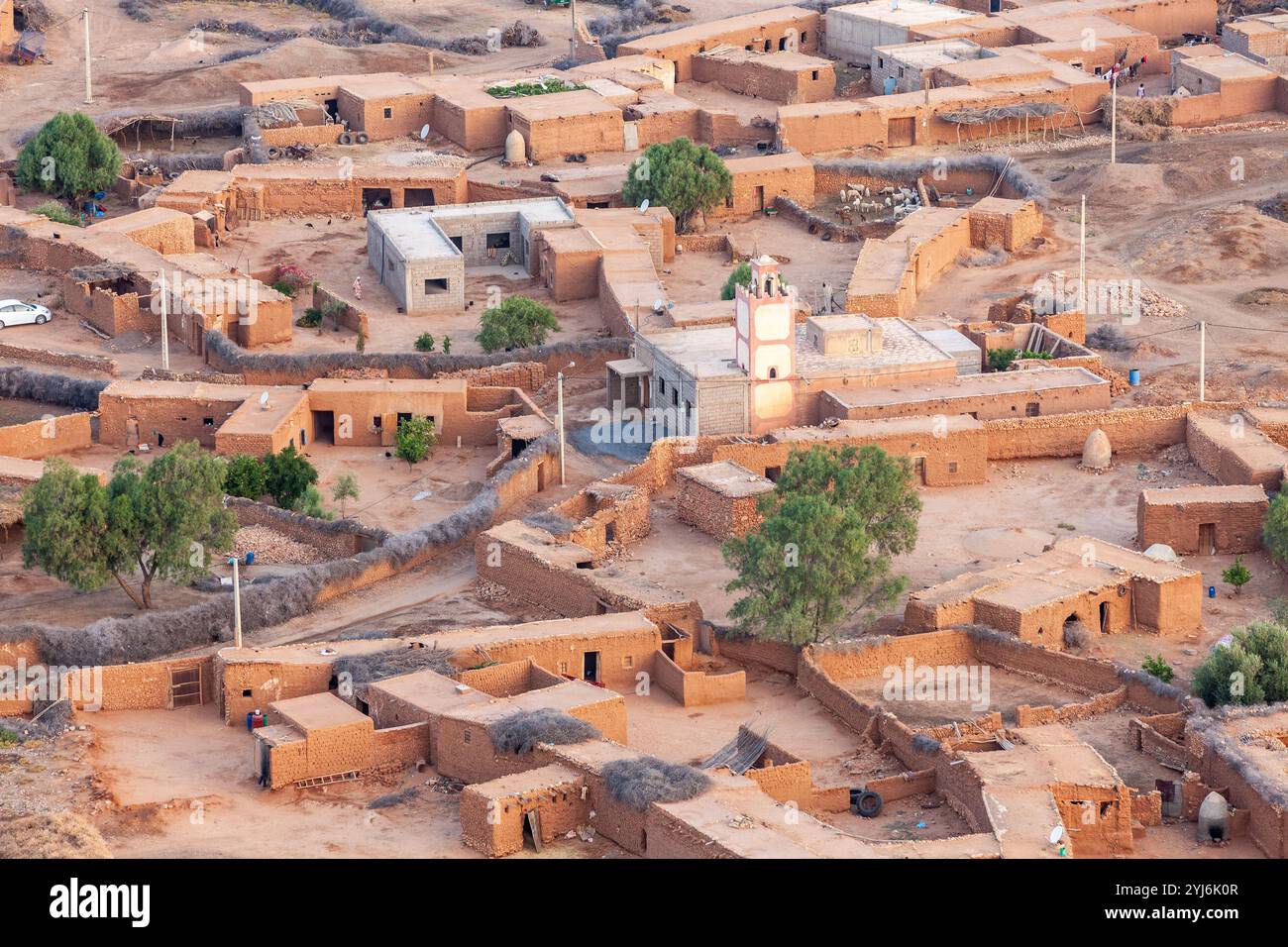 Aerial view of a traditional Moroccan village in a desert plain at the ...