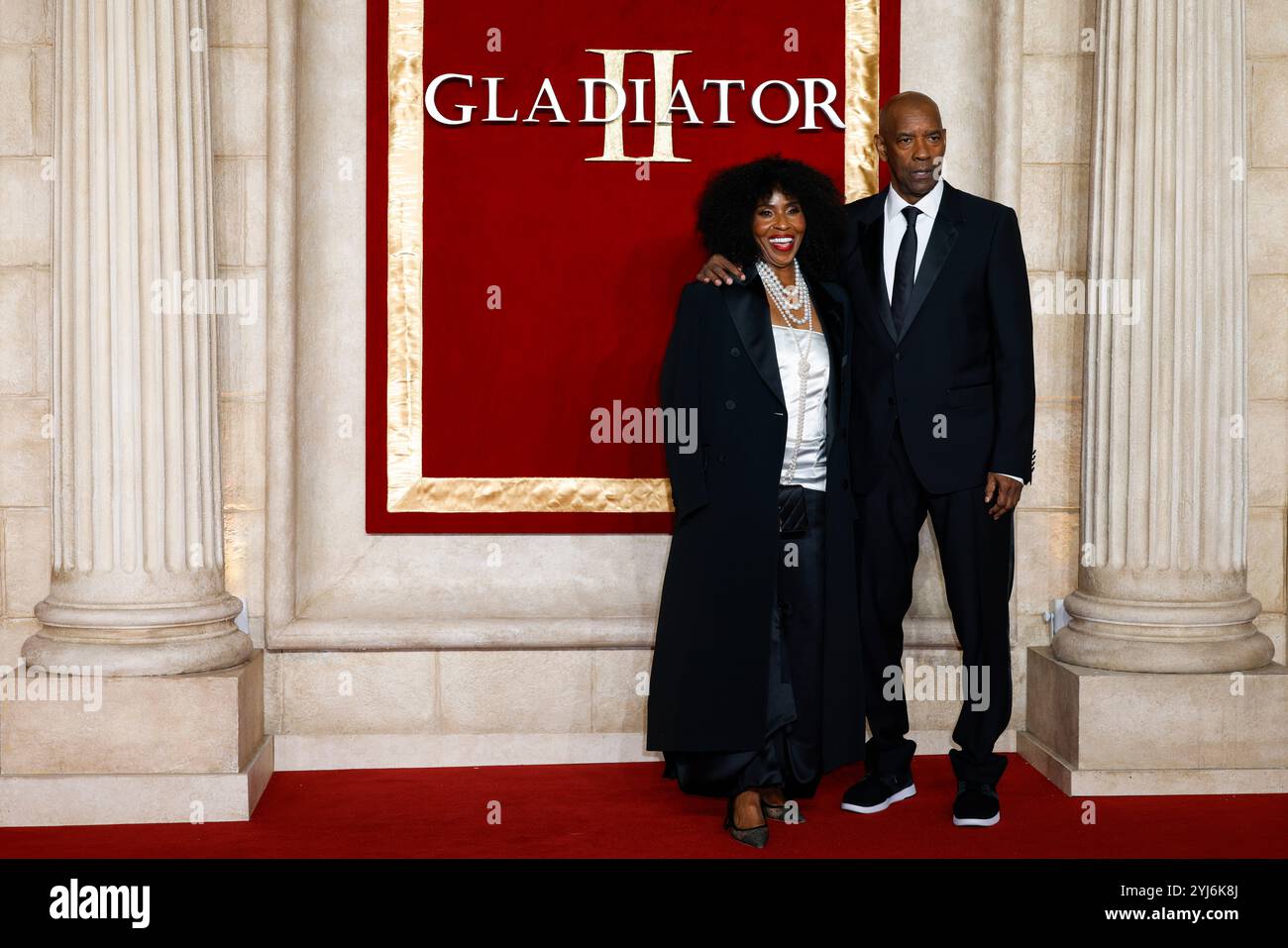 Pauletta Washington, left, and Denzel Washington pose for photographers ...