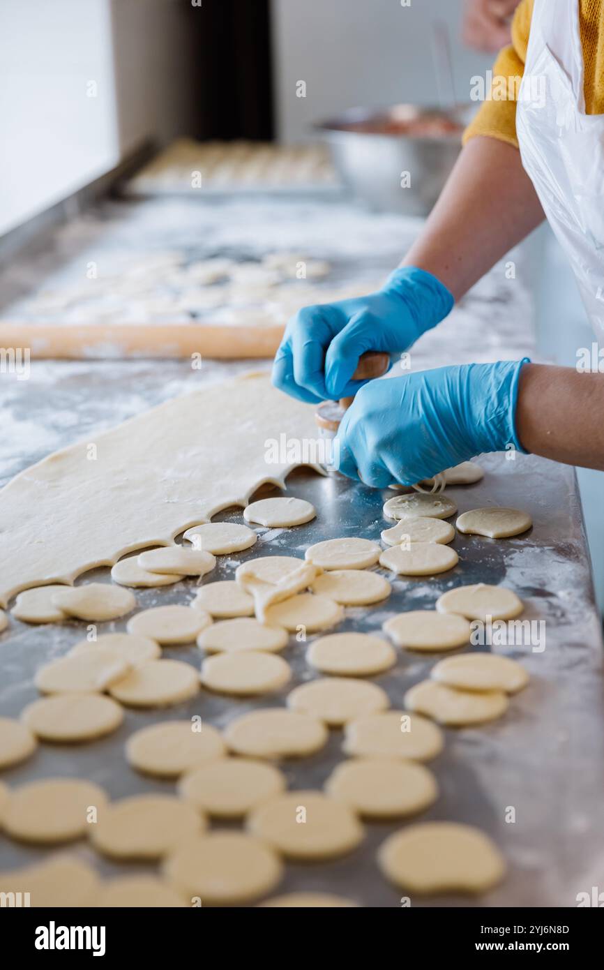 Preparing dough circles for traditional dumplings, showcasing handmade ...