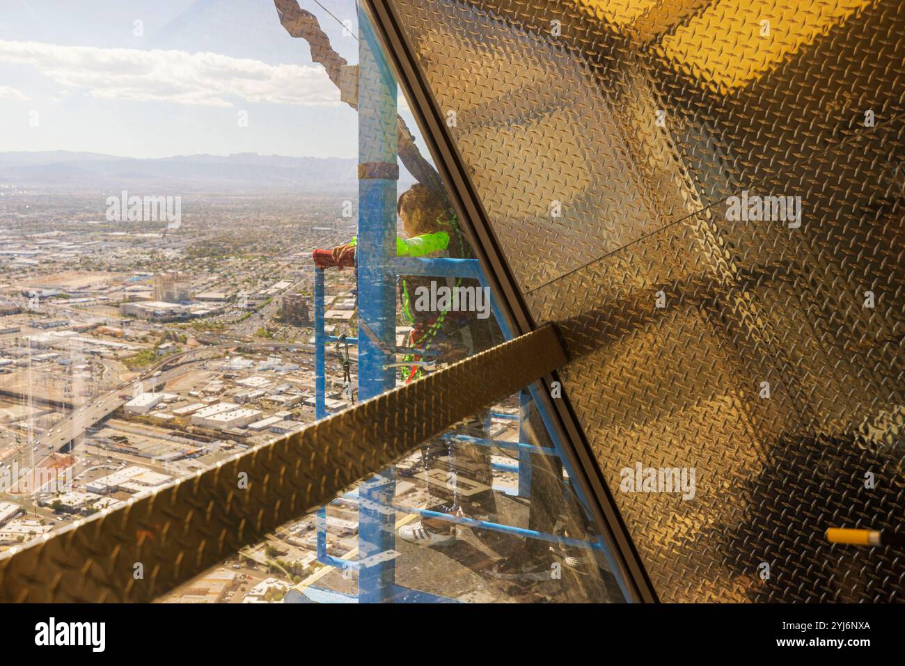 Girl standing on outdoor platform of Sky Jump at The Strat in Las Vegas ...
