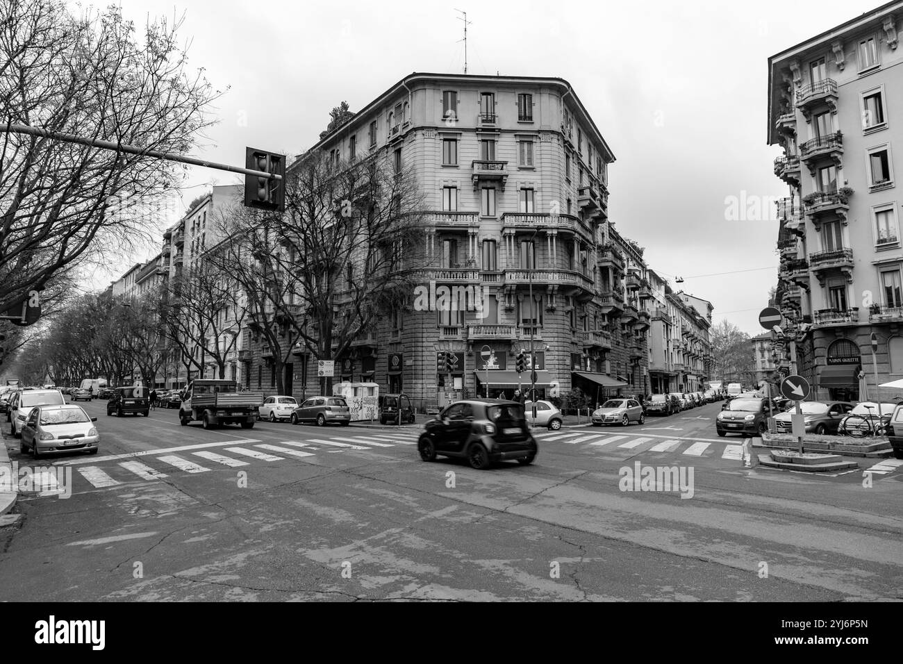 Milan, Italy - March 30: Typical Italian buildings and street view in ...