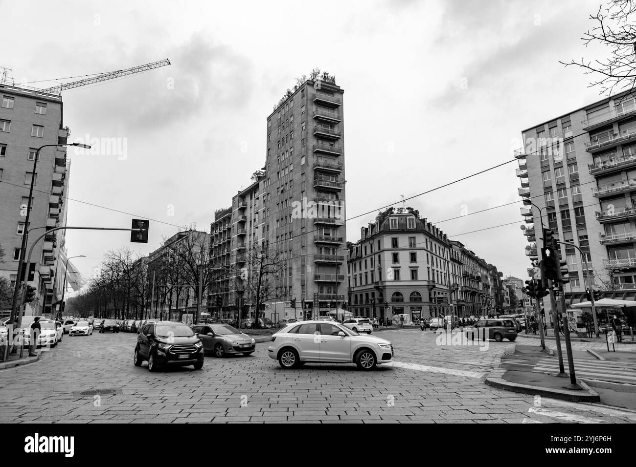 Milan, Italy - March 30: Typical Italian buildings and street view in ...