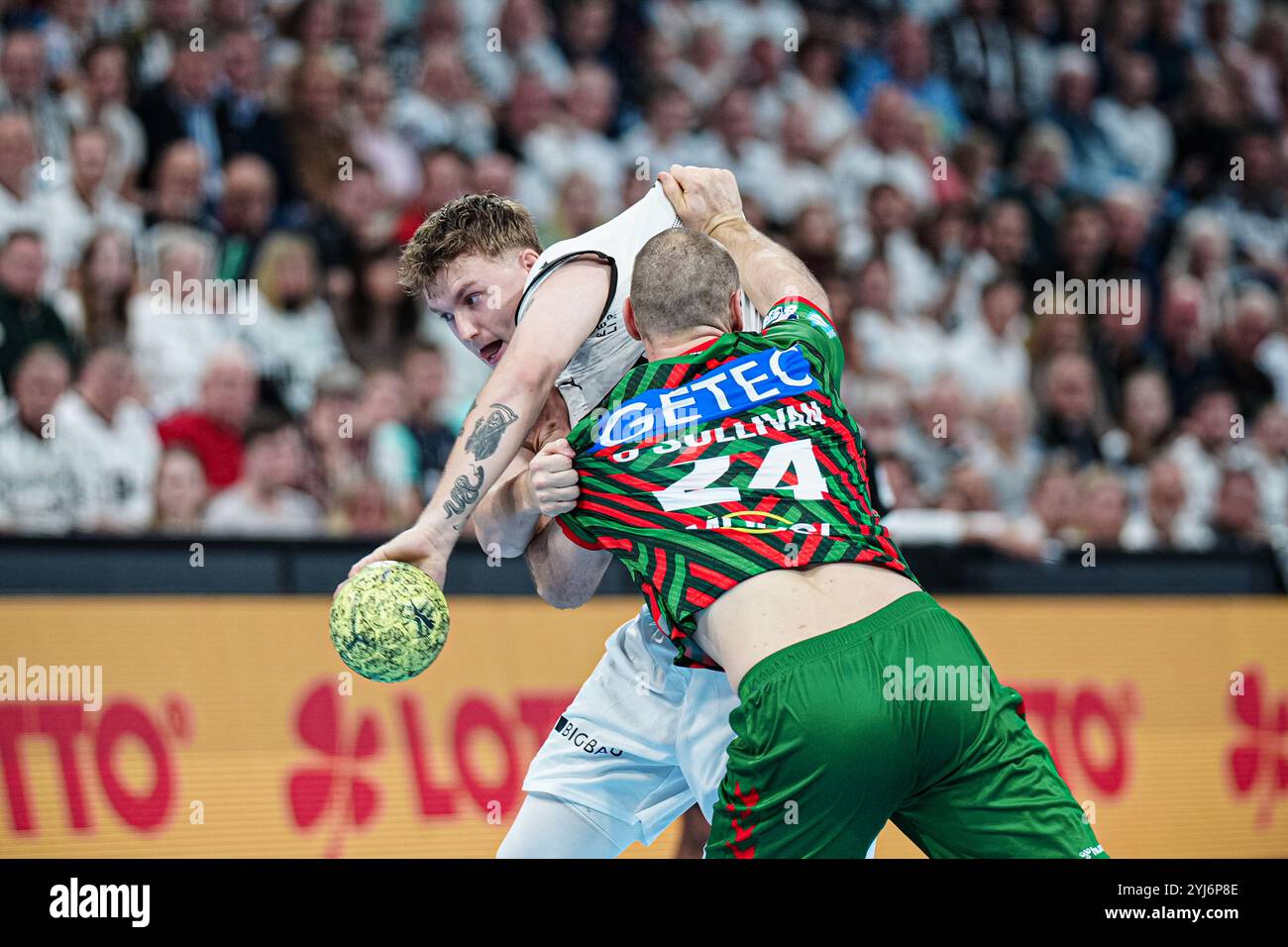 Emil Wernsdorf Madsen (THW Kiel, #45), Chrstian O Sullivan (SC Magdeburg, #24) GER, THW Kiel vs ...